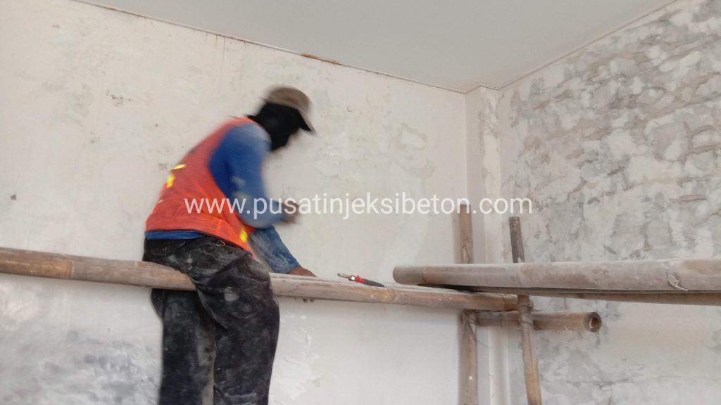 Waterproofing Coating Pada Dinding Kantor Wisma 99